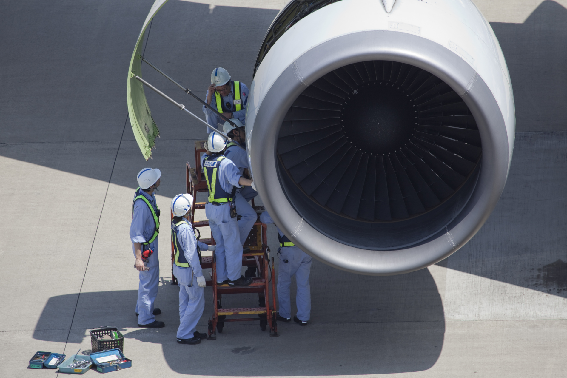 Why do most aircraft have engines under the wings?